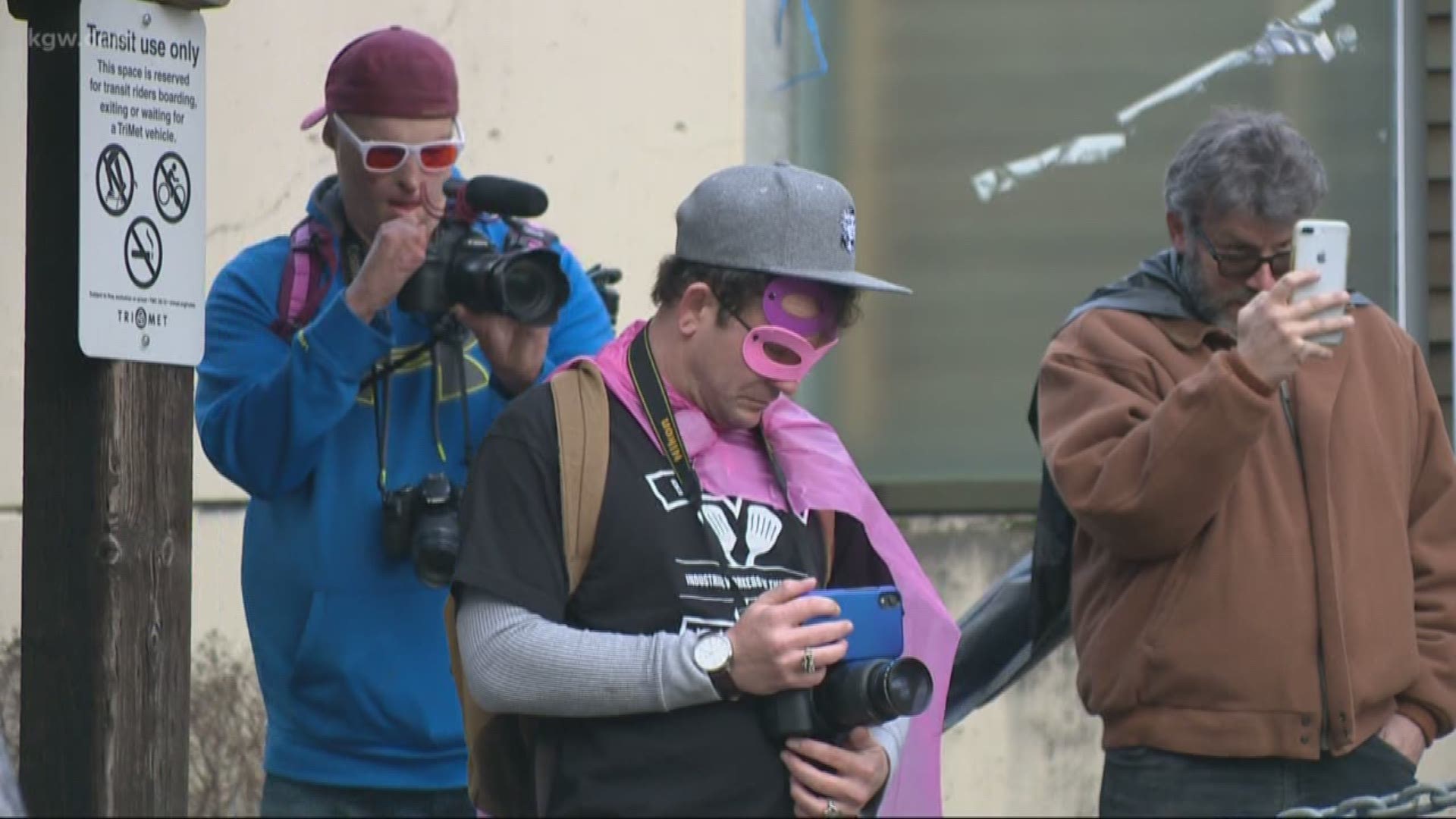 Protesters dress as superheroes outside Portland's ICE headquarters ...