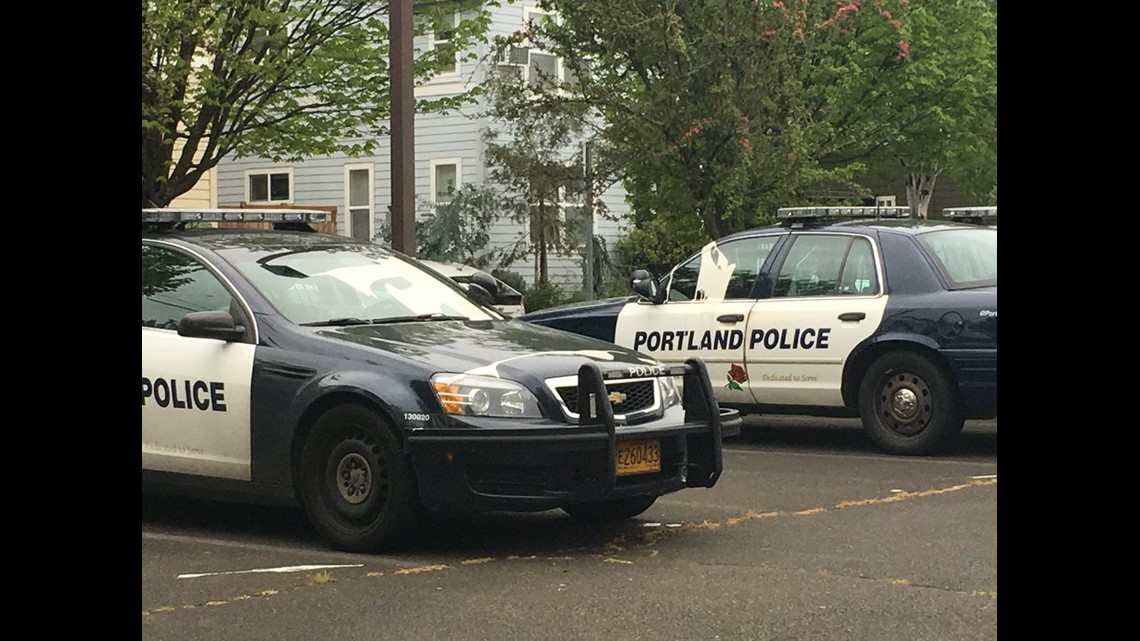 Photos: Paint dumped on Portland police cars | kgw.com