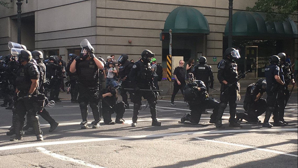 Police deem dueling protests 'riot' in downtown Portland | kgw.com
