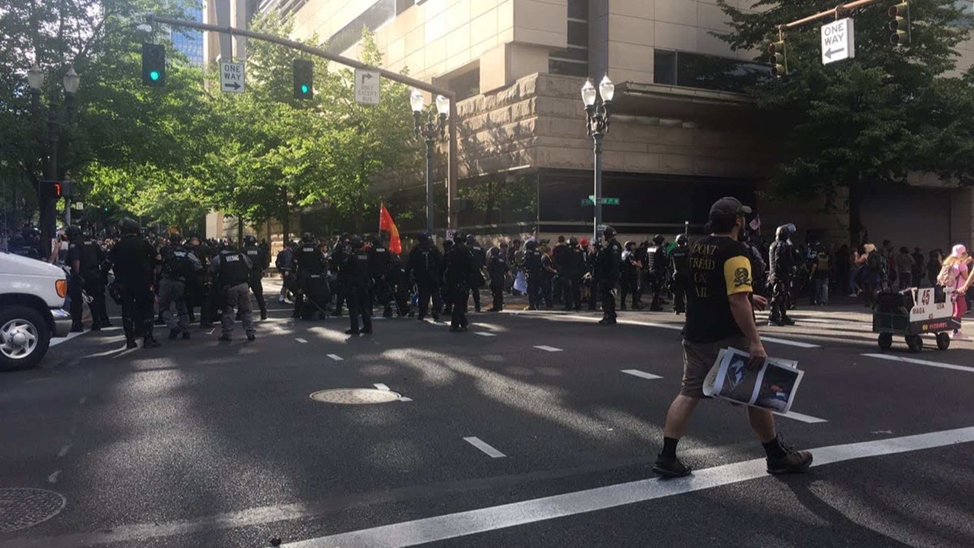 Police deem dueling protests 'riot' in downtown Portland | kgw.com
