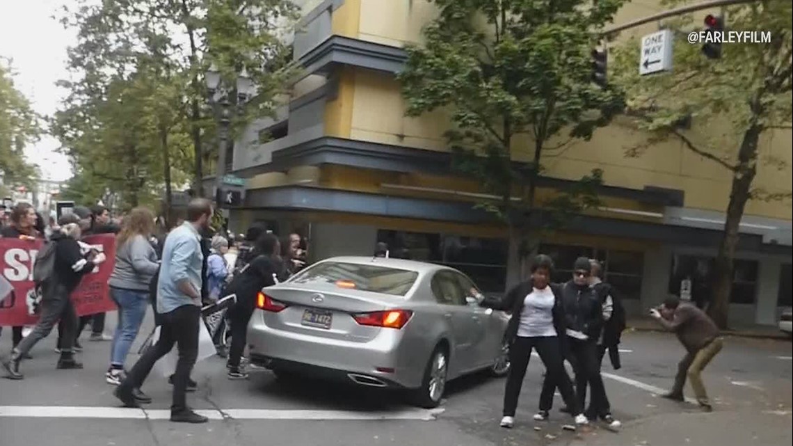 Driver claims group damaged his car during protest of Portland police ...