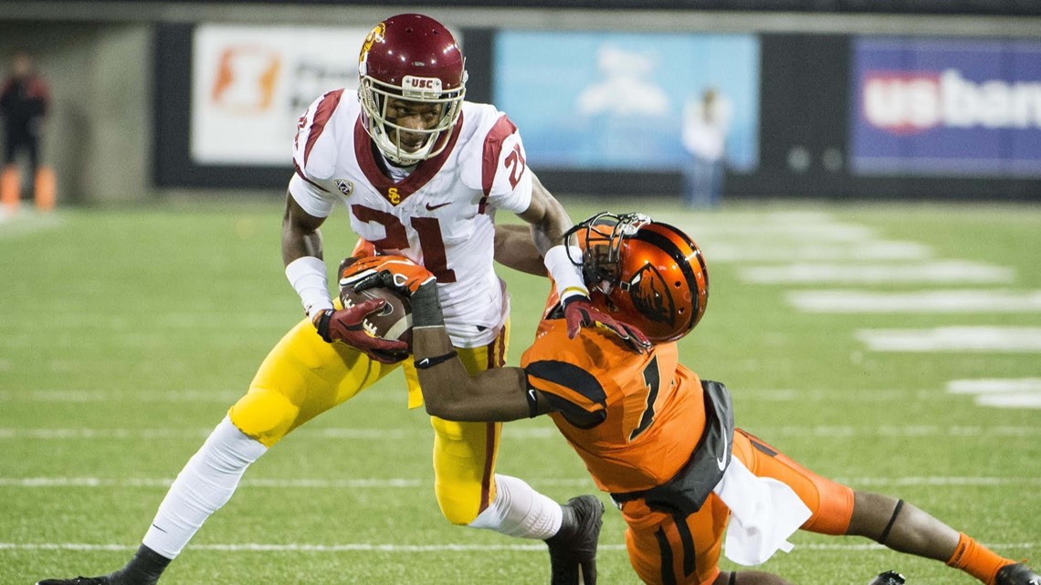 Ware runs for 205 yards, 3 TDs as USC beats Oregon St. 38-21 | kgw.com