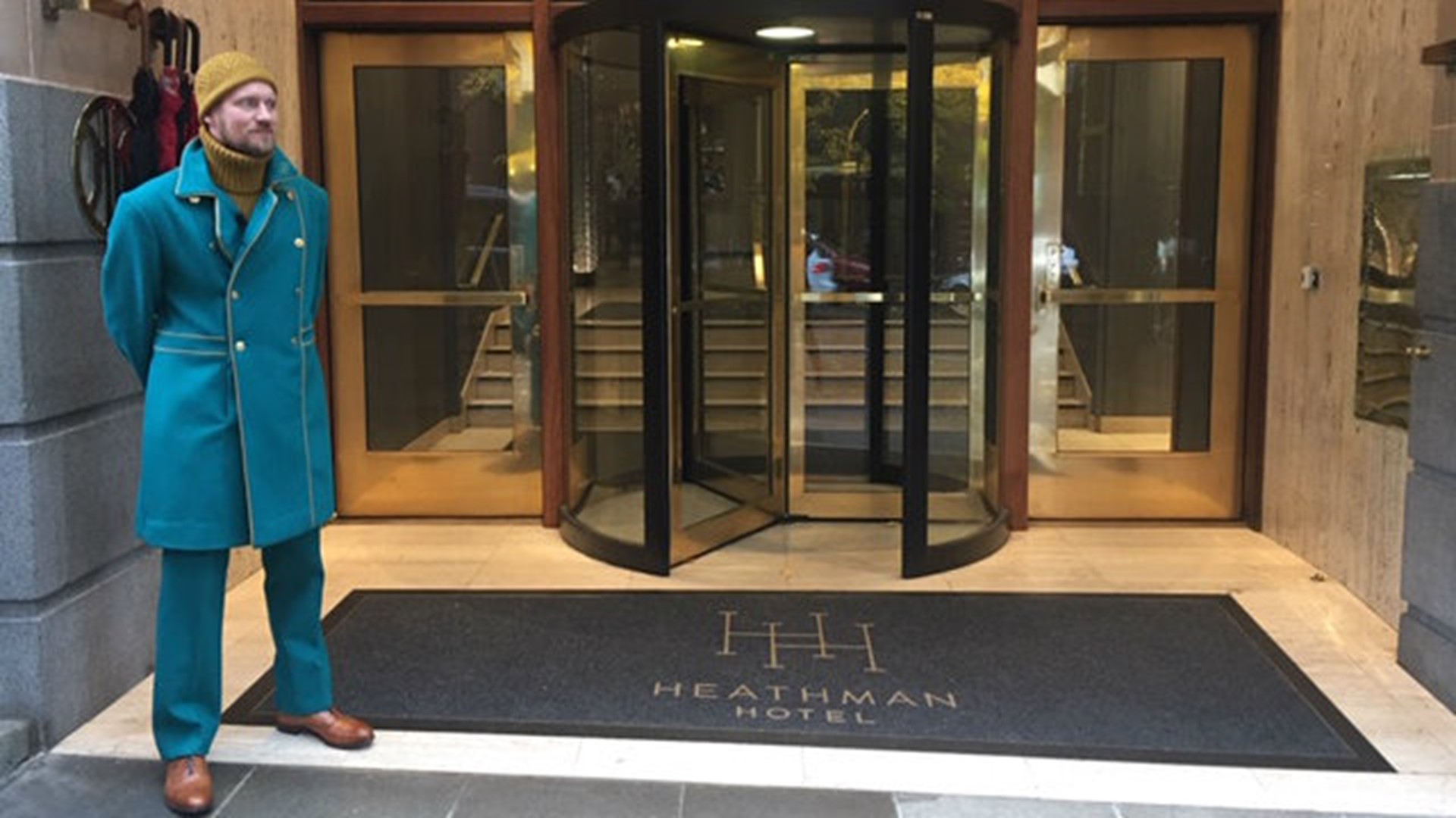 Out with the Beefeater, In with new Heathman doorman uniforms | kgw.com