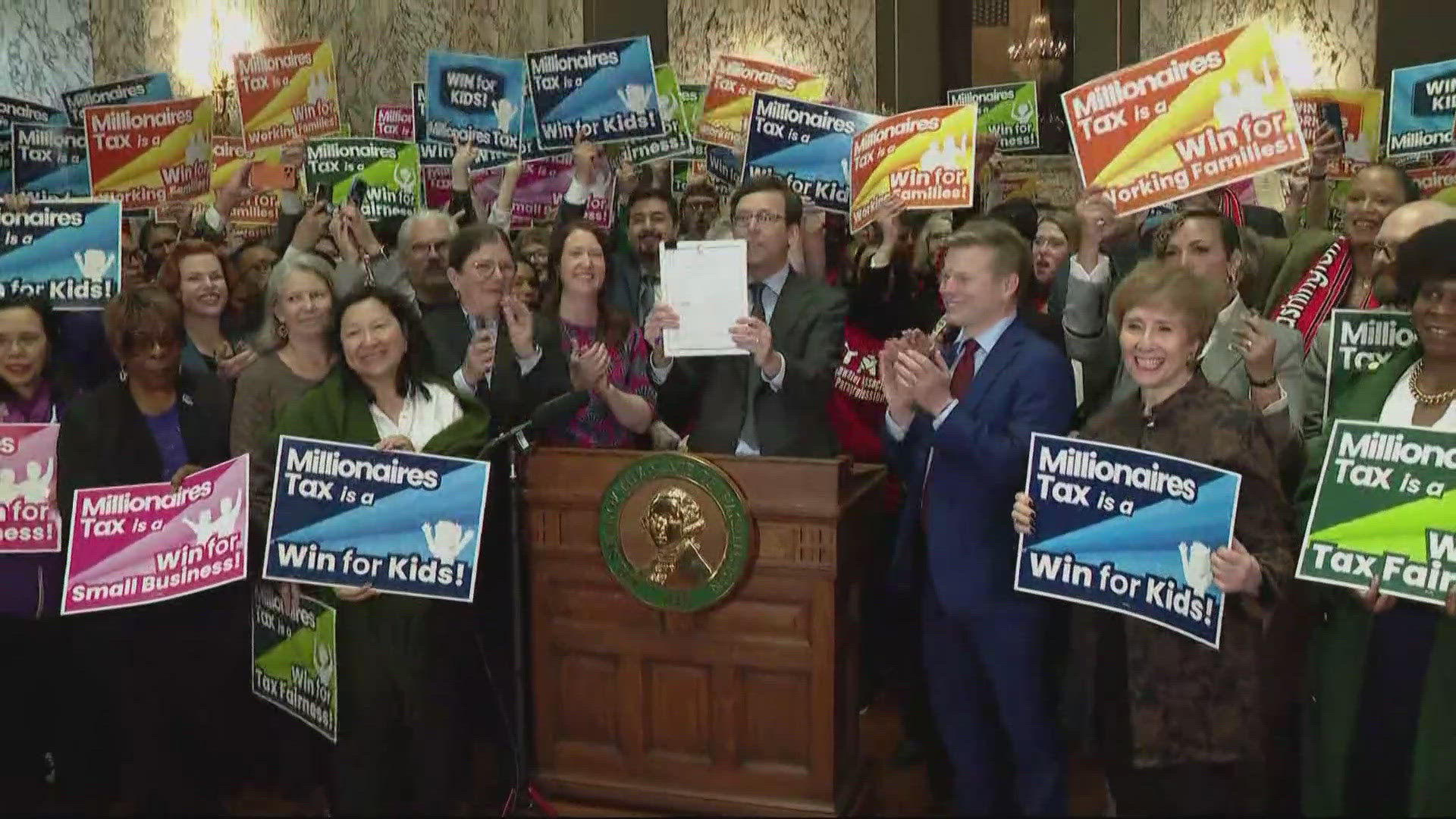 Washington governor signs 'millionaires' tax into law | kgw.com