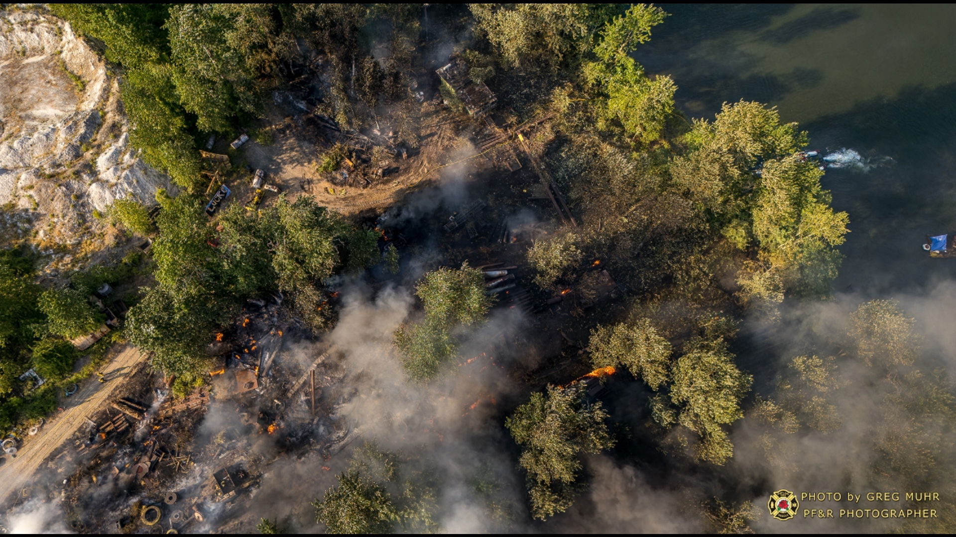 Abandoned equipment, tires on fire at Ross Island | kgw.com