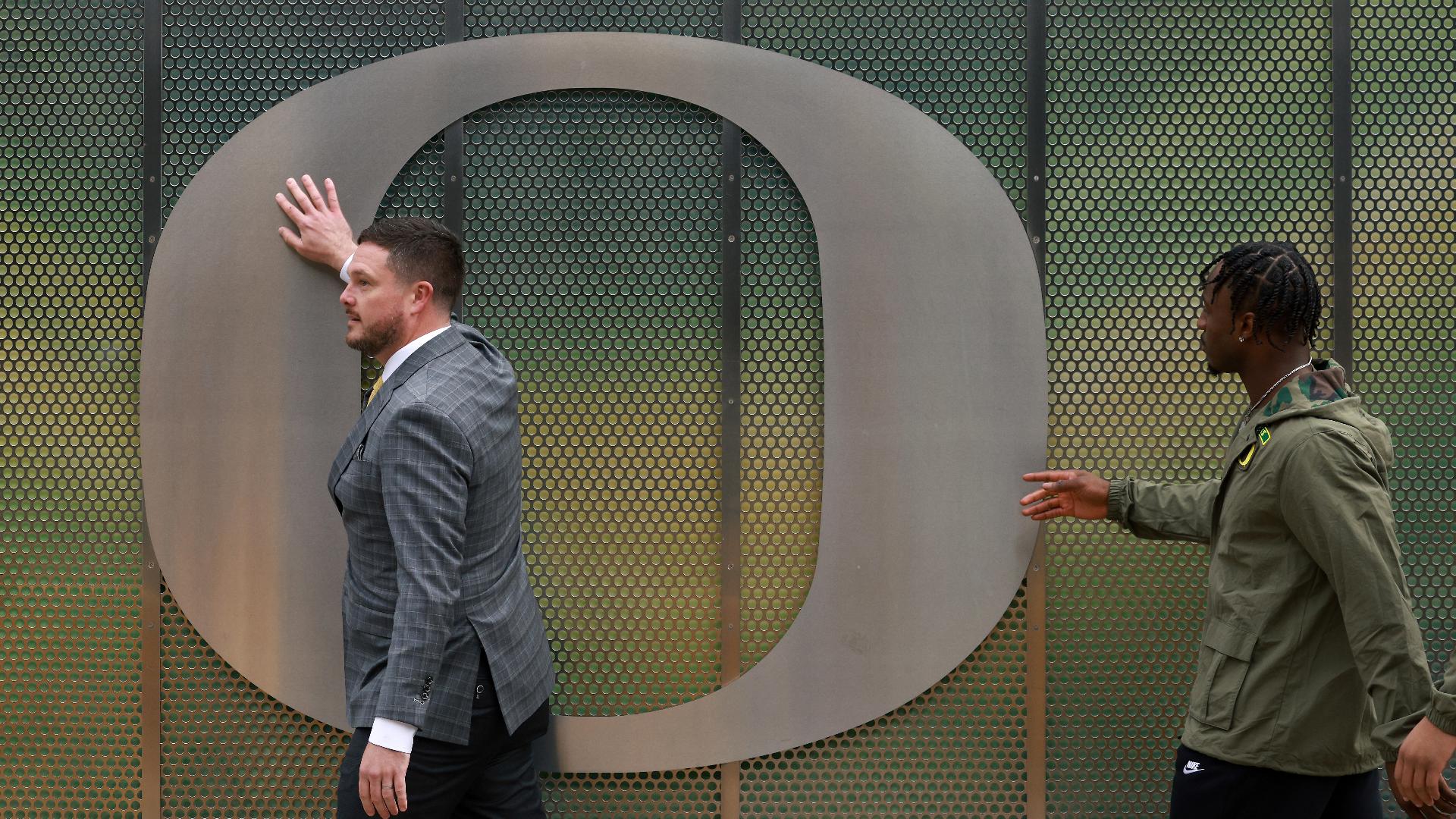 Large 'O' above University of Oregon splattered with red paint before ...