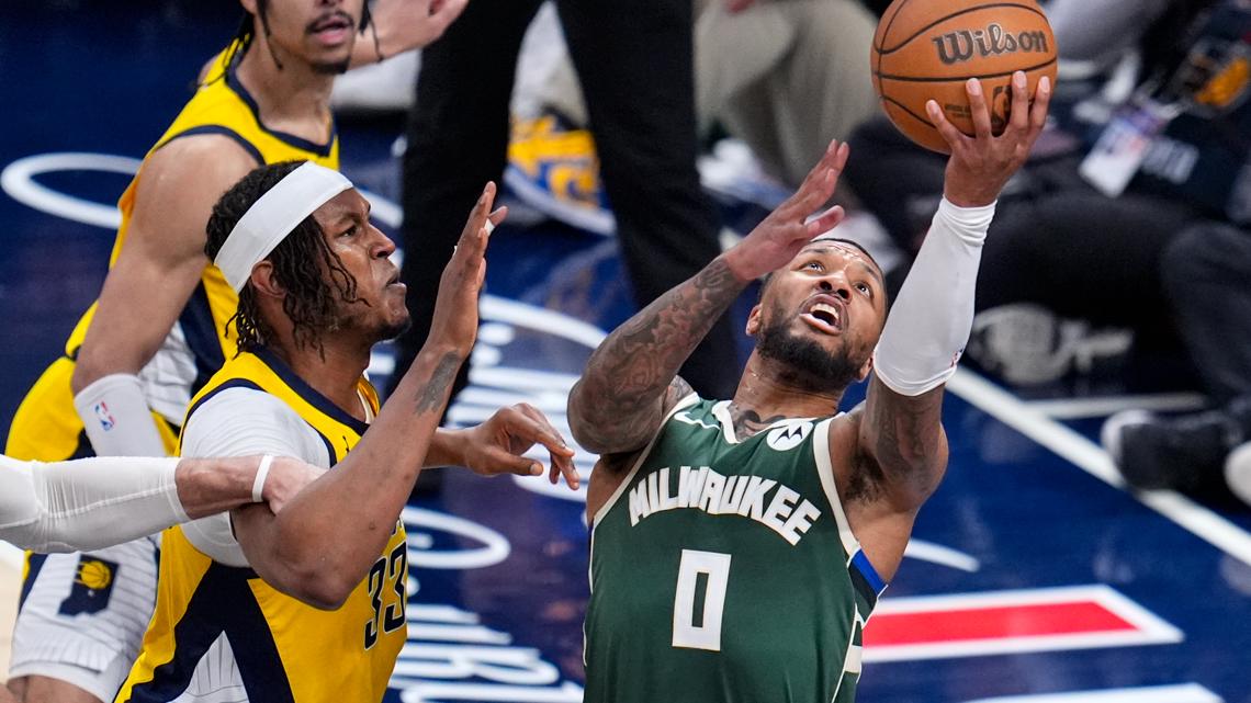 Bucks' Lillard hurts Achilles in Game 3 loss, doubtful for Game 4 | kgw.com