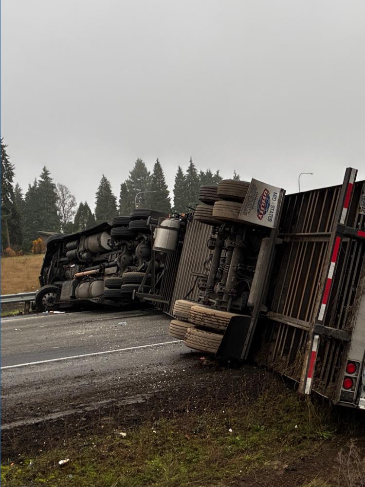Semi-truck rollover blocks I-5 in Castle Rock; driver cited for ...