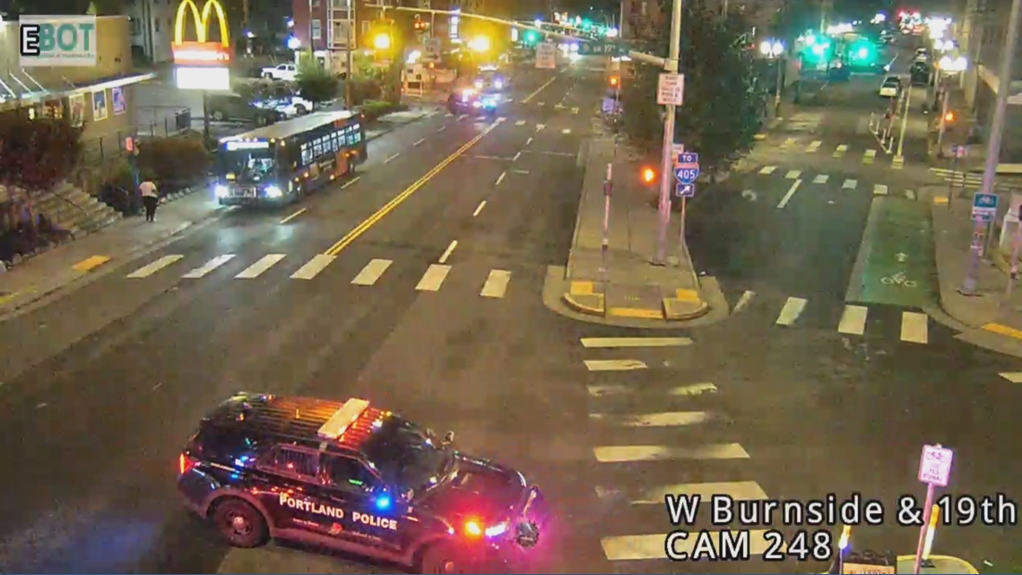 West Burnside Street reopens after bicycle, police car crash | kgw.com