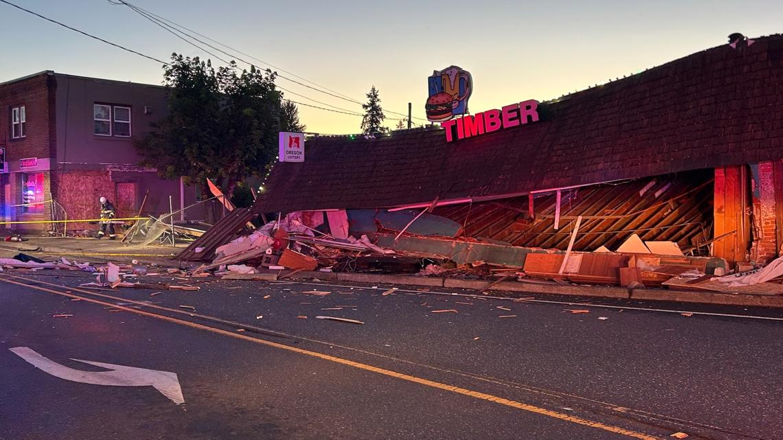 Person dies after car crashes into sports bar causing partial roof ...