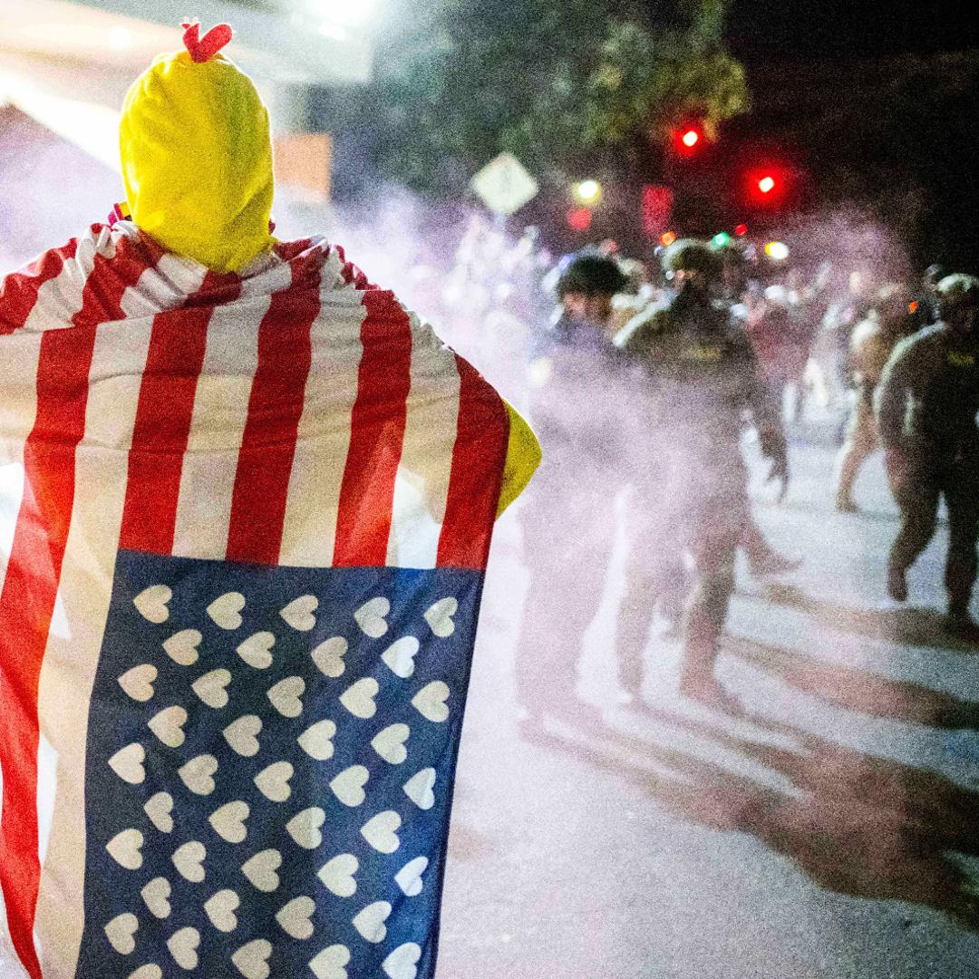 Anti-ICE protester's frog costume gains a reach well beyond the small ...