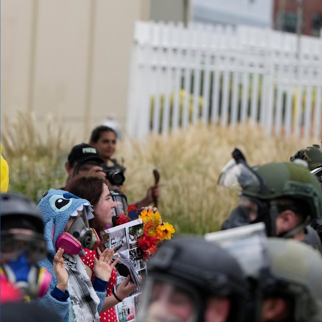 Anti-ICE protester's frog costume gains a reach well beyond the small ...