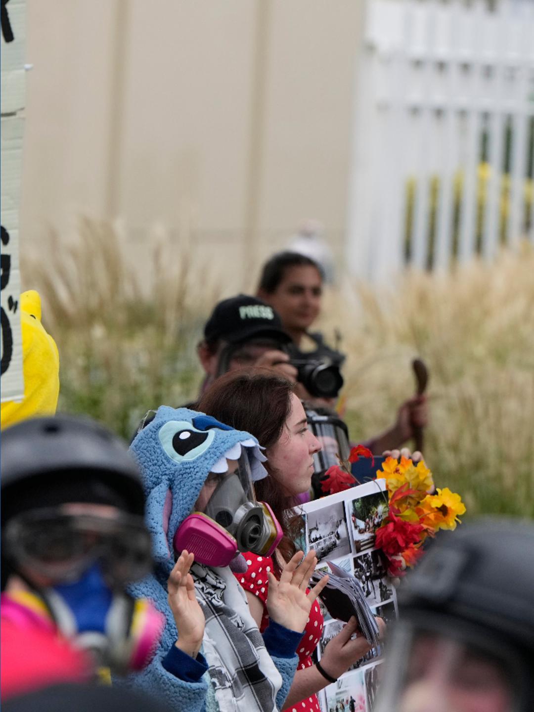 Anti-ICE protester's frog costume gains a reach well beyond the small ...