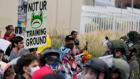 Anti-ICE protester's frog costume gains a reach well beyond the small ...