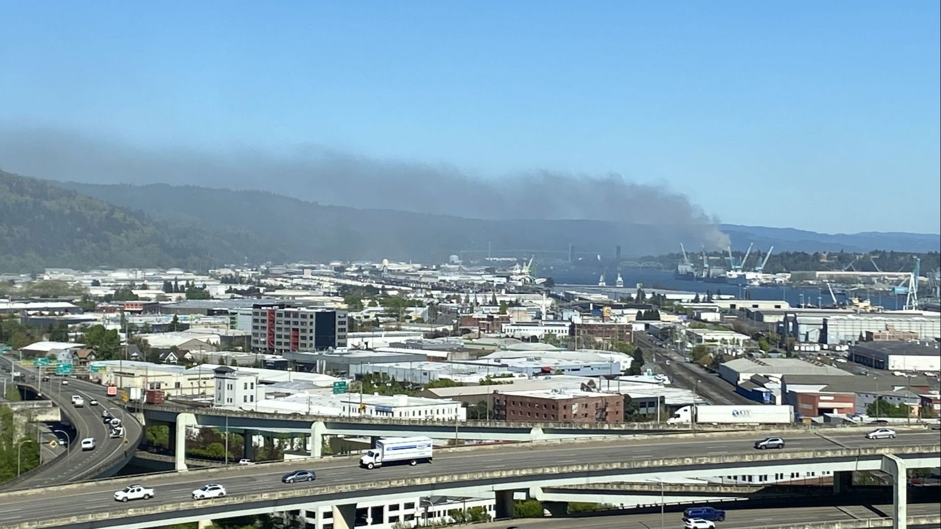 Large fire burning in wood debris pile in North Portland | kgw.com