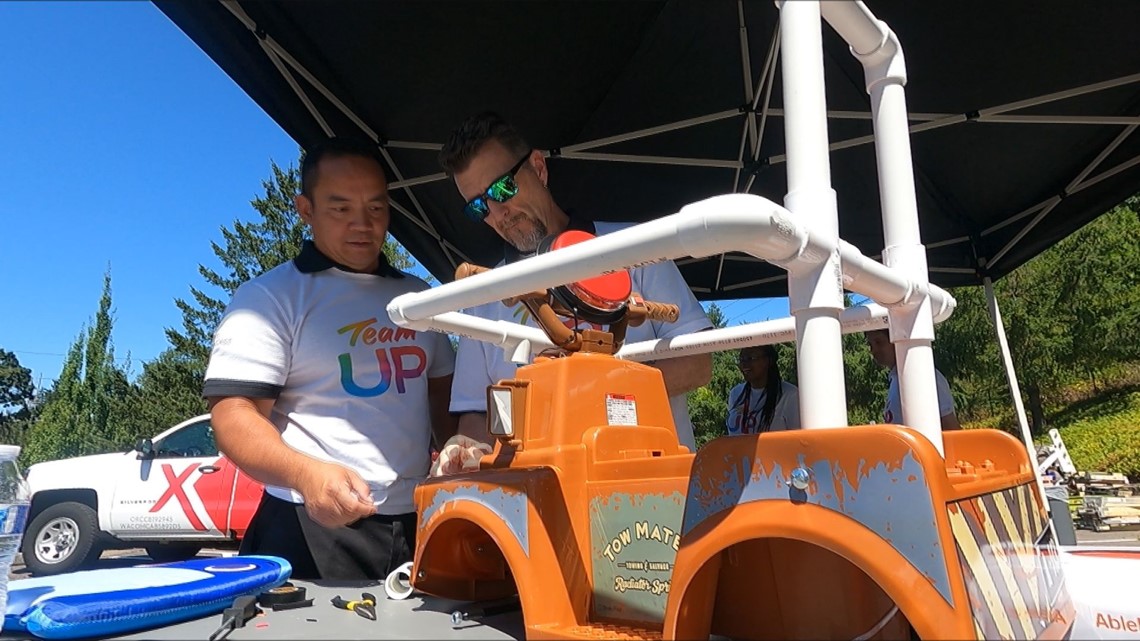 Volunteers build toy cars for kids with mobility challenges | kgw.com