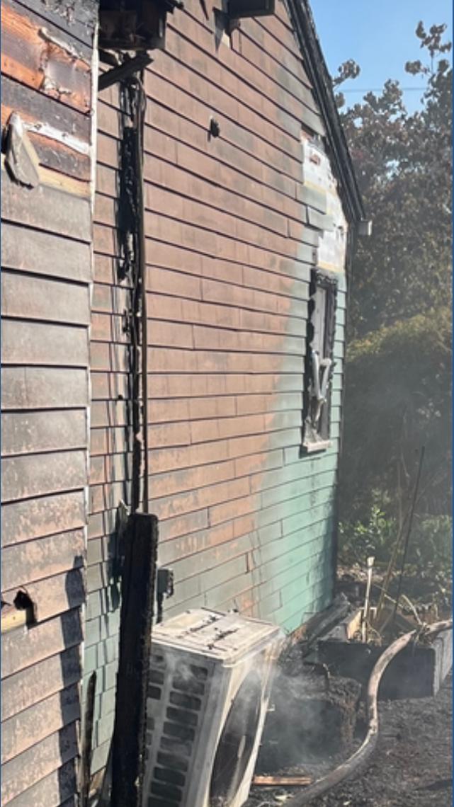 Crews extinguish house fire that spread to second home in Southeast ...