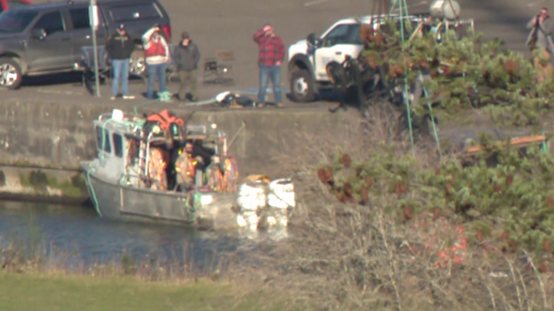Part of vehicle pulled from Columbia River; believed to be Martin ...