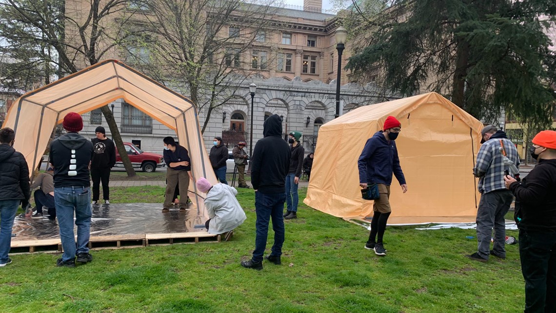 Group puts up downtown tents in response to homeless camp sweeps | kgw.com