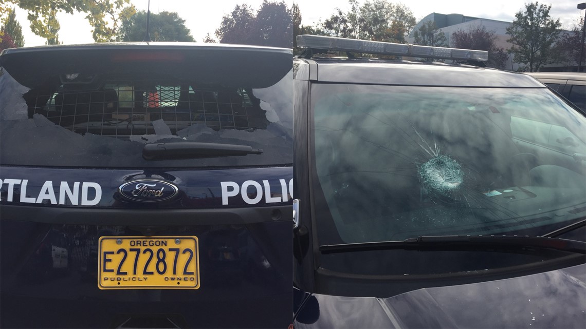Man throws large rocks at Portland police cars | kgw.com