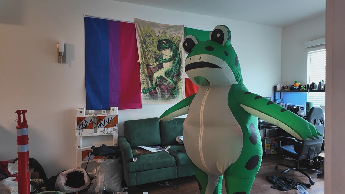 Anti-ICE protester's frog costume gains a reach well beyond the small ...