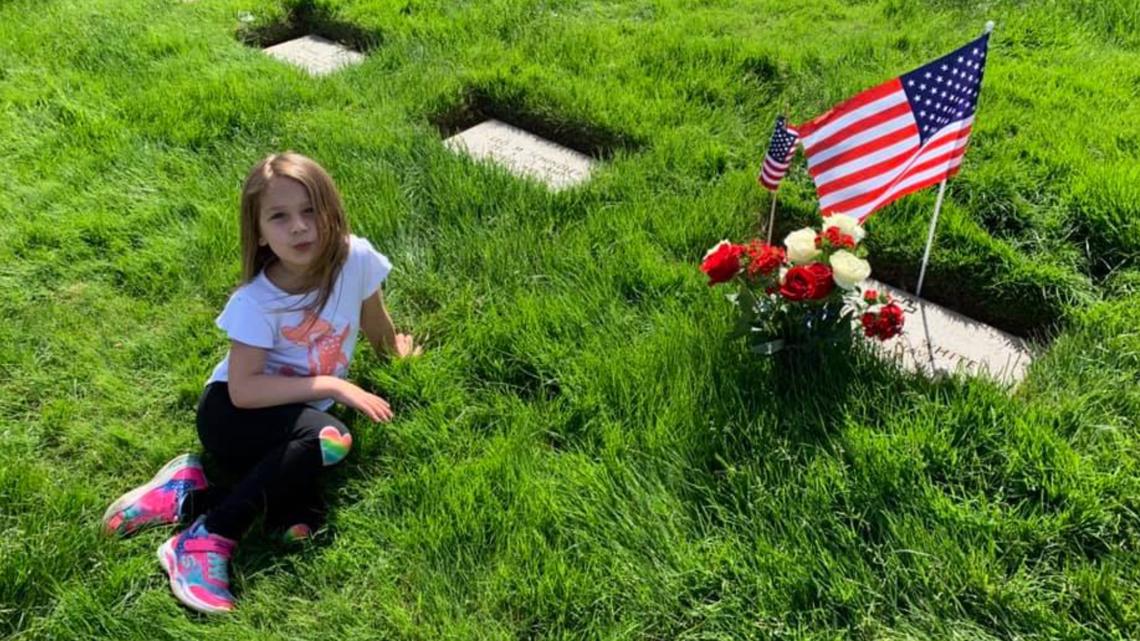 Family places flags at military graves for Memorial Day | kgw.com