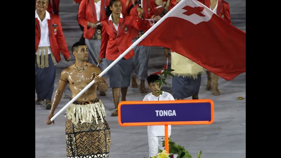 Introducing the Tonga flagbearer who glistened during Rio Olympic ...