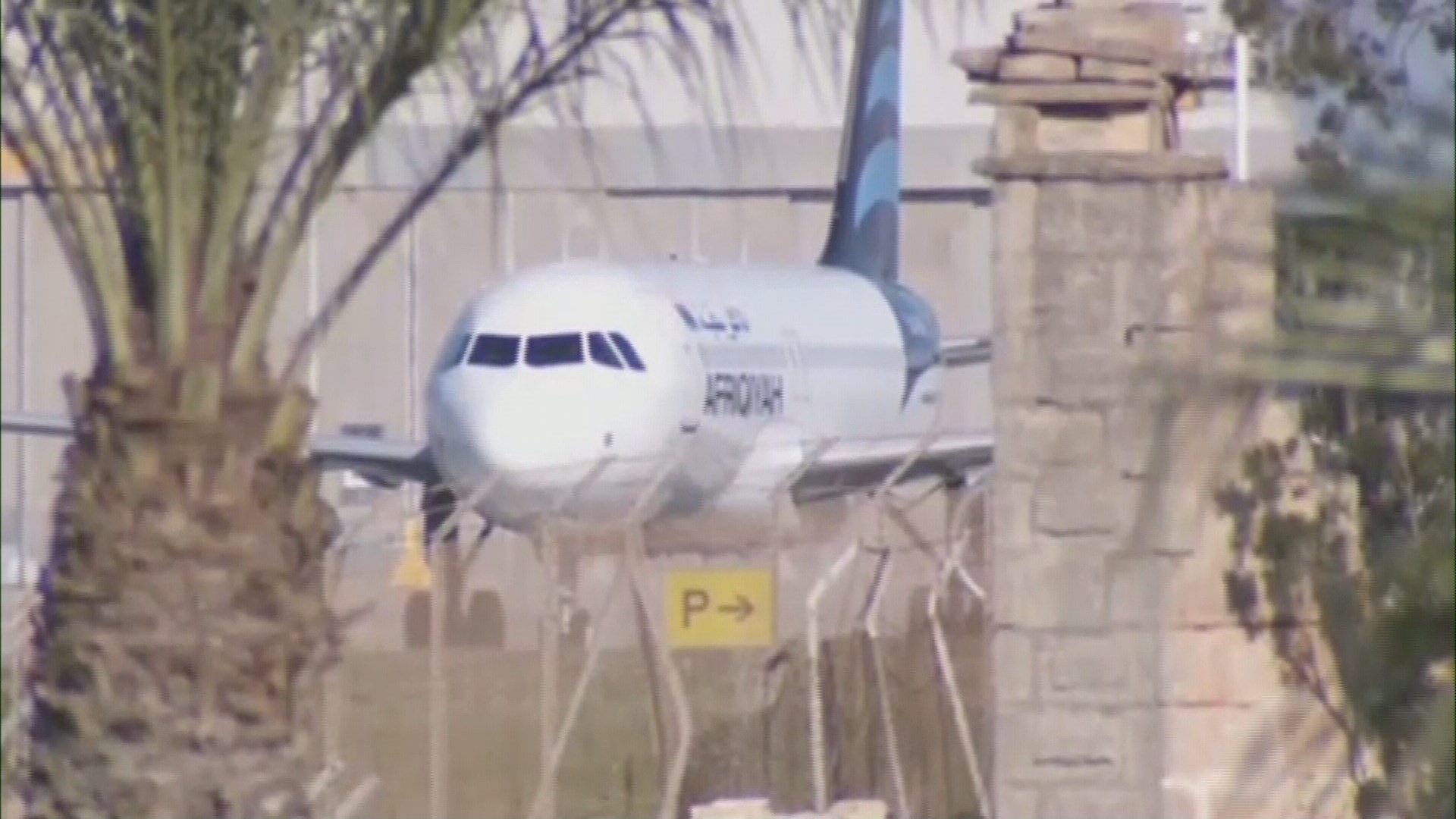 Hijackers surrender, leave Libyan plane with final crew members | kgw.com