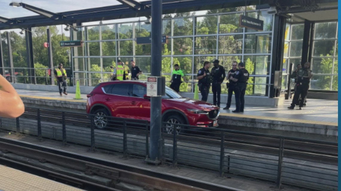 Car drives onto elevated light rail tracks in Seattle | kgw.com