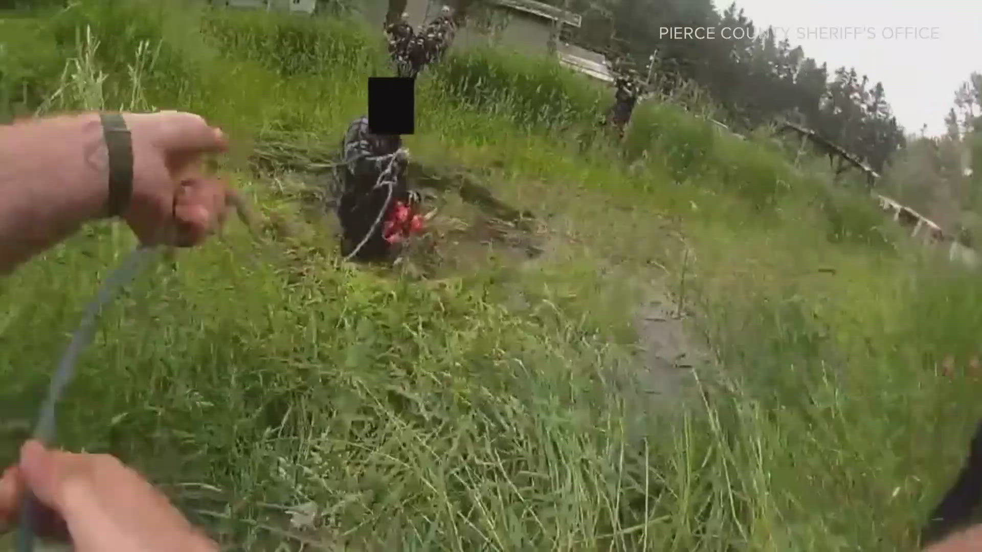Deputy uses lasso to pull man Pierce County pond | kgw.com