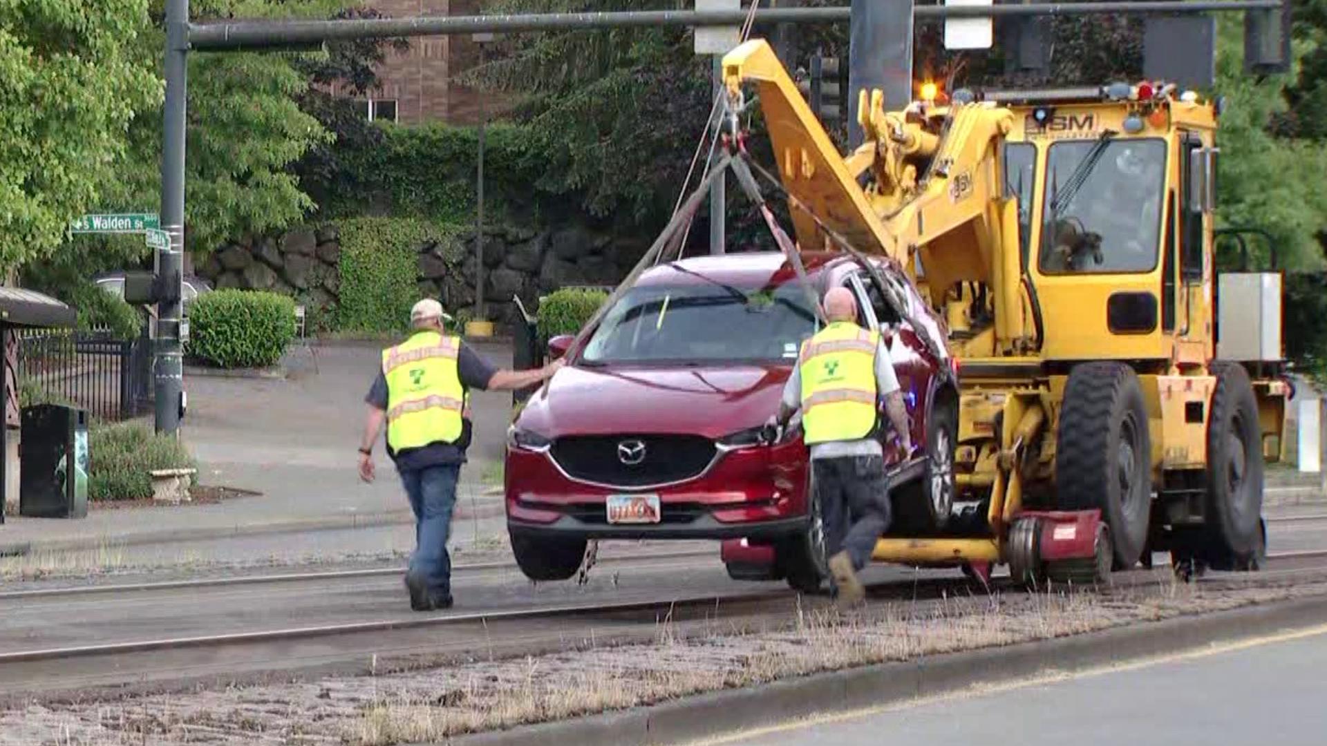 Car drives onto elevated light rail tracks in Seattle | kgw.com