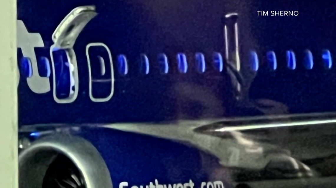 Passenger opens emergency exit, jumps on wing, creates panic | kgw.com